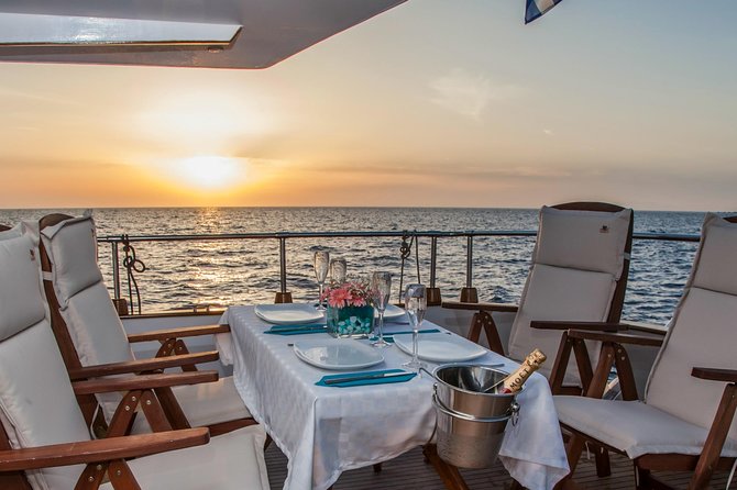 Santorini: Motor Yacht Sunset Cruise With 5-Course Dinner - Safety and Accessibility