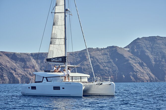 Santorini Oia: Private Sunset Catamaran Cruise With BBQ & Drinks - Taking in the Picturesque Aegean Seascape