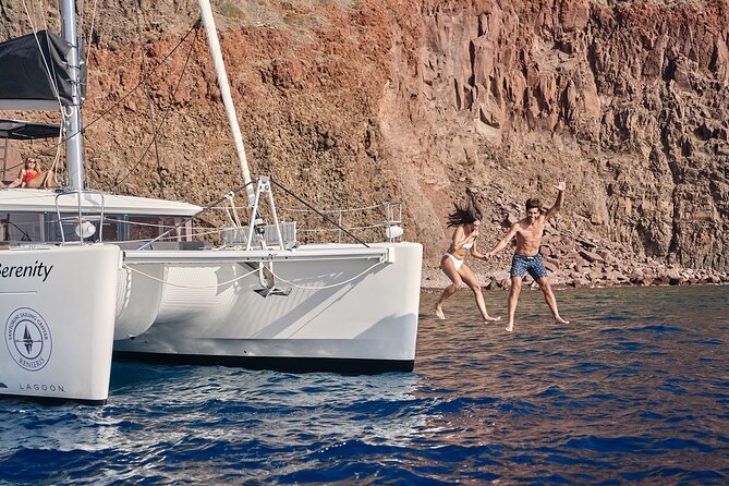 Santorini Oia: Private Sunset Catamaran Cruise With BBQ & Drinks - Indulging in Unlimited Local Beverages