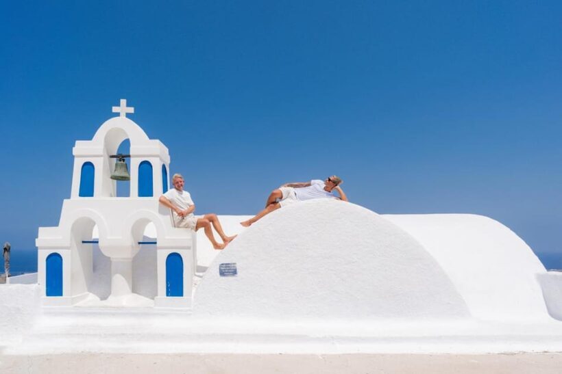Santorini Photoshoot with Blue Domes & Caldera View - Authentic Perspectives from Past Participants