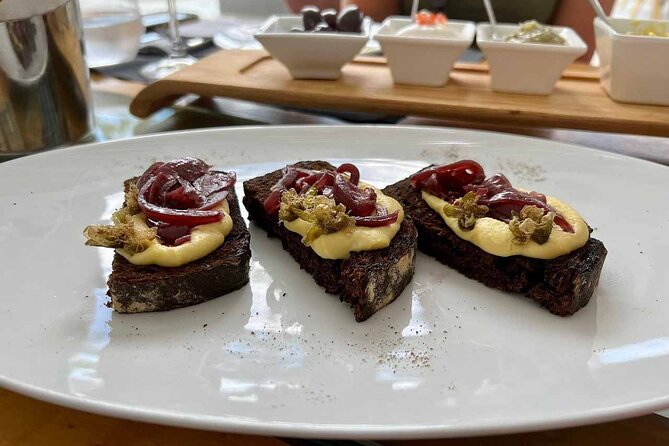 Santorini Private Wine Tour in 3 Wineries With Full Greek Meal - Wine Tasting Experience