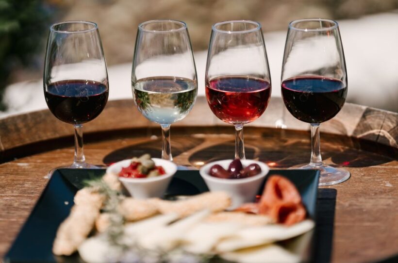 Santorini: Wine Tasting Tour to 3 Wineries with Transfer - Authenticity and Atmosphere
