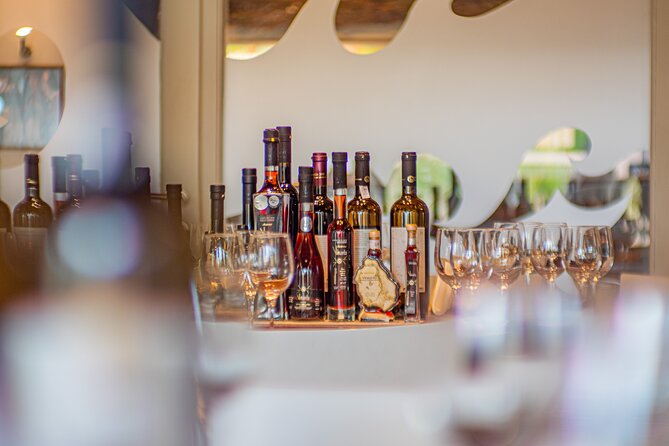 Santorini Wine Tour With Sunset in Oia - Unique Experiences and Highlights