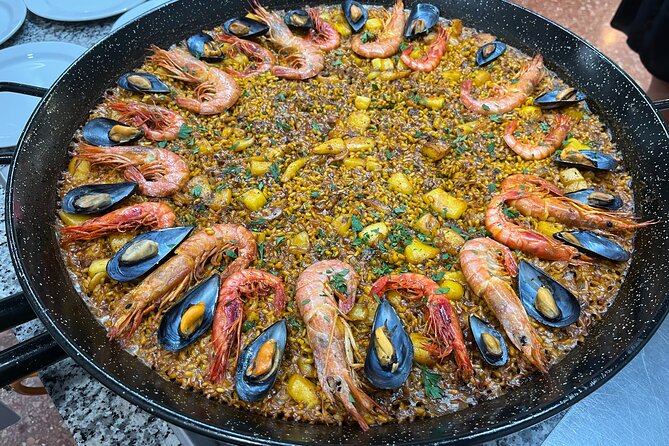 Seafood paella cooking class, tapas and visit to Ruzafa market. - Practical Details and Considerations