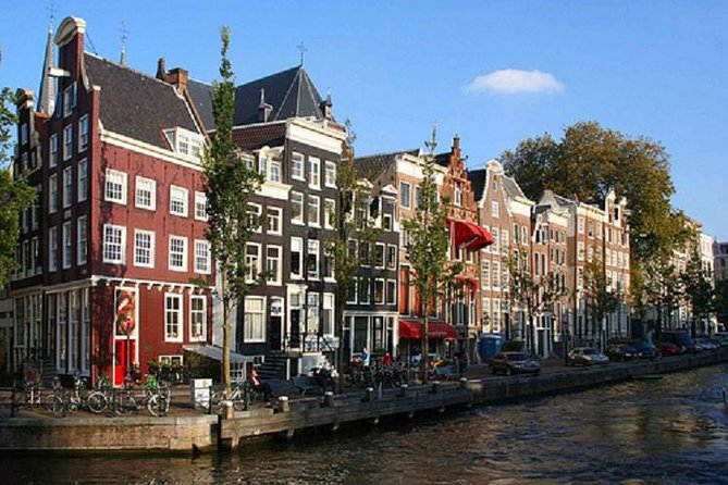 Secrets of Amsterdam Walking Tour Plus Dutch Sweets Tasting - Exploring Amsterdams Rich History