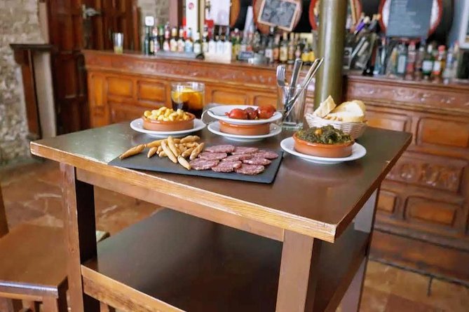Sevilla Food Tour: Tapas, Wine, History & Traditions - Walking Through Seville’s Historic Streets