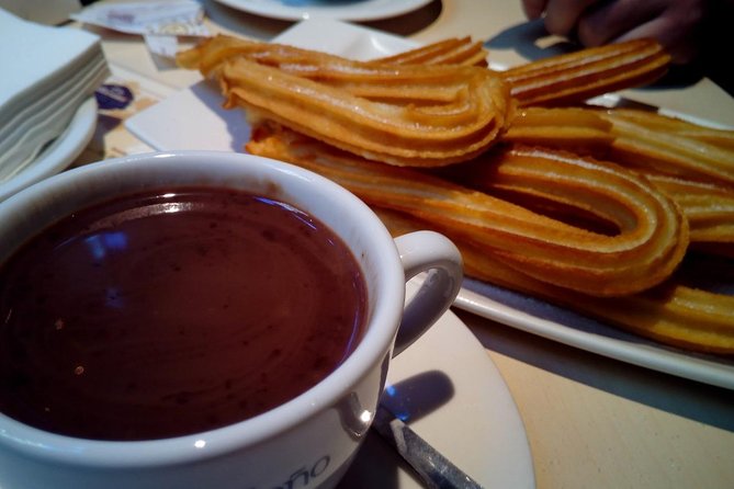 Seville Food Tour: Tapas, Drinks and Delights With a Local - Churros With Chocolate: a Popular Spanish Dessert