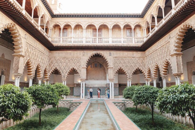 Seville: Guided Walking Tour with Alcazar & Cathedral Access - Key Points