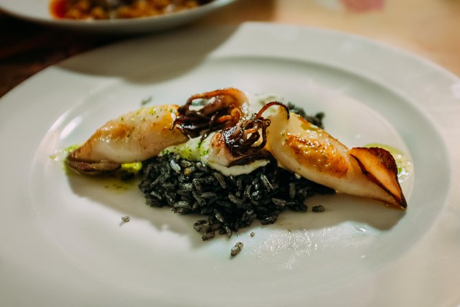 Seville Off the Beaten Path Tapas and Market Tour - Nighttime Landmarks: A Feast for the Eyes