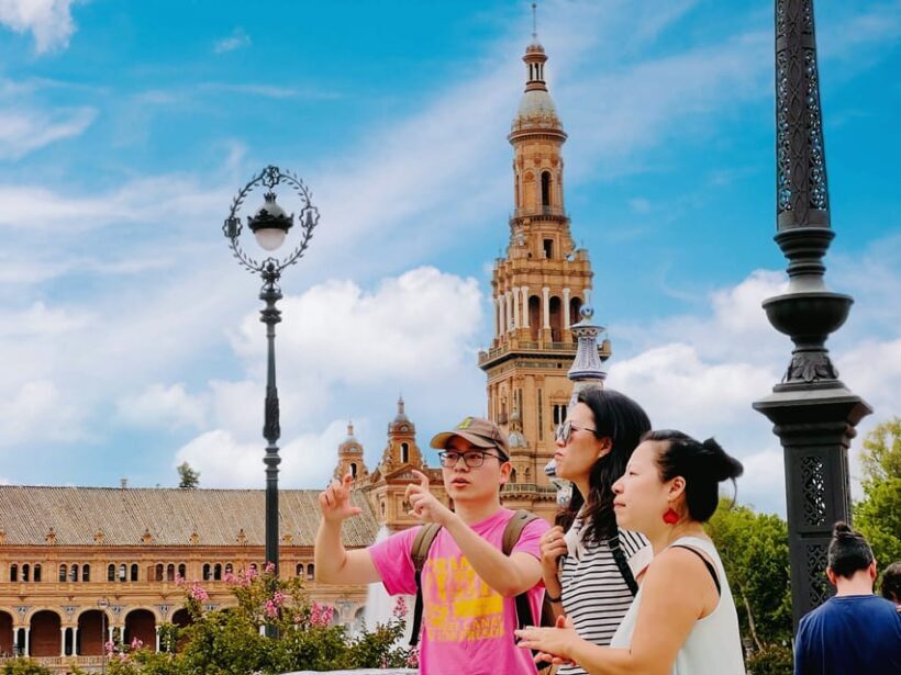 Seville: Royal Alcazar & Highlights of Seville Walking Tour - Plaza de España: A Grand Welcome
