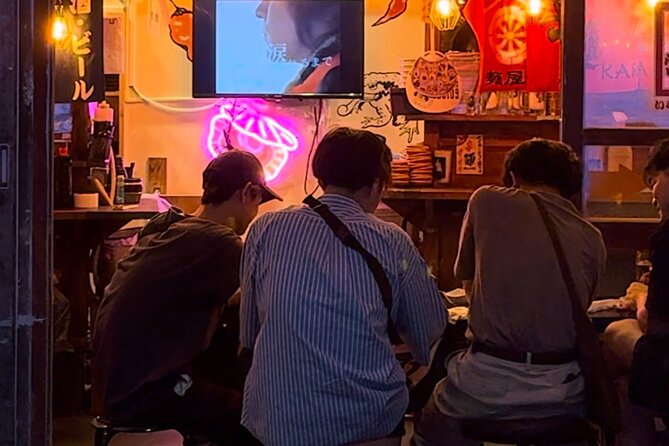 Shinjuku Explore Tokyo With Japanese Food and Izakaya - Exploring Shinjukus Lively Neighborhoods