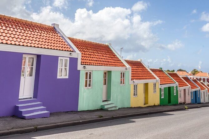 Shop and Beach Guided Tour in Curacao City - Shopping at Punda: Local Flavors and Fashions