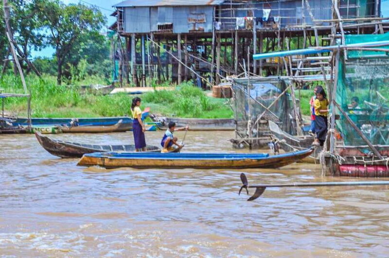 Siem Reap: Floating Village Sunset Boat Guided Vespa Tour - Sunset from the Upper Deck