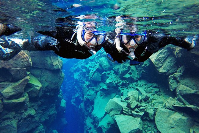 Silfra Drysuit Snorkeling Tour with Free Photos - From Reykjavik - Authentic Experiences and Real Travel Insights