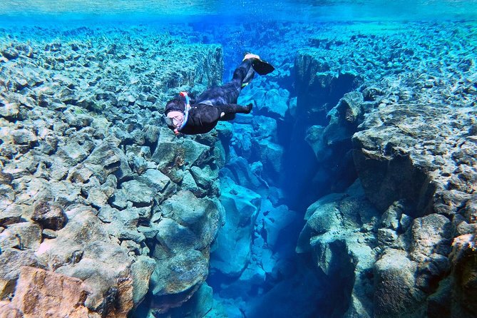 Silfra Wetsuit Snorkeling - Meet on location | Free Photos - Authenticity and Scenic Surroundings