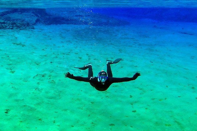 Silfra Wetsuit Snorkeling Tour With Underwater Photos - From Reykjavik - Preparing for the Tour