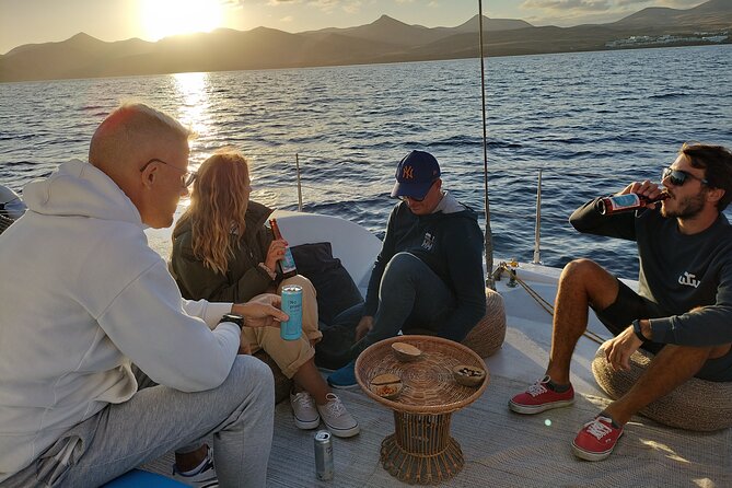 Small Group Dolphin Sunset Tour Review - Eco-Friendly Catamaran Experience