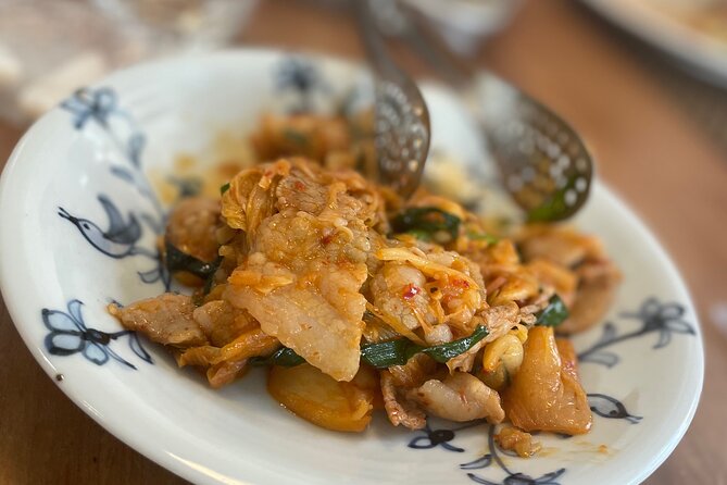 Small-Group Osaka-Style Okonomiyaki Cooking Class - Osaka-Style Okonomiyaki: A Savory Japanese Delight