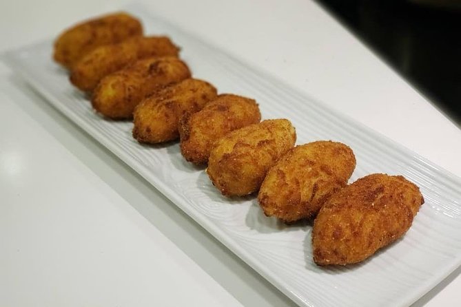 Small Group Tapas and Paella Cooking Class in Madrid - Pricing and Booking Information