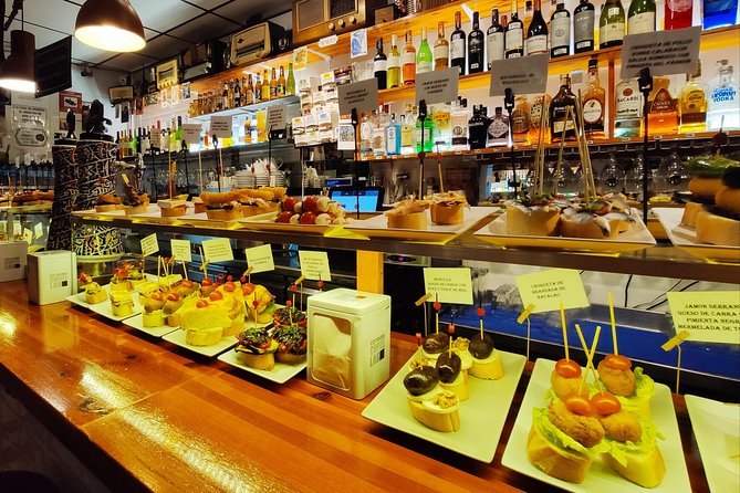 Spanish Wine and Tapas Tour in a Local Neighborhood in Barcelona - Booking and Pricing Details