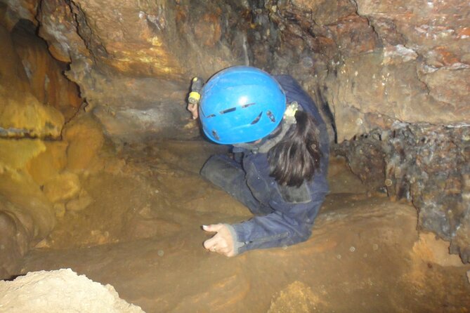 Speleology, Exploration Inside a Secret Cave - The Role of a Local Guide in Enhancing Your Caving Experience