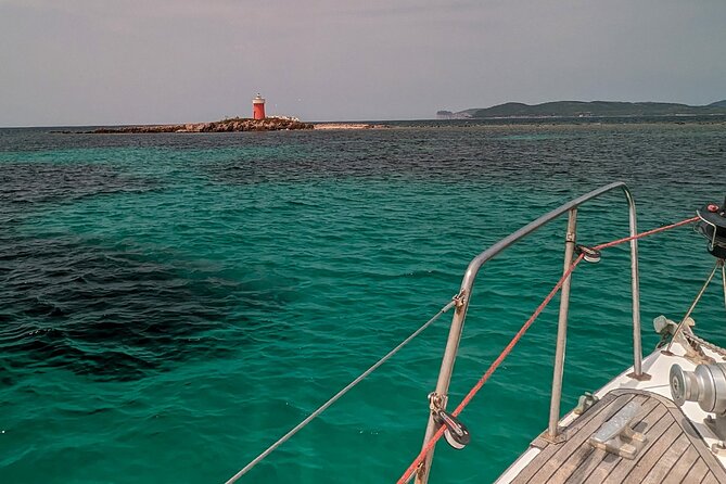 Sunset and Aperitif on a Sailing Boat in Alghero - Location and Highlights