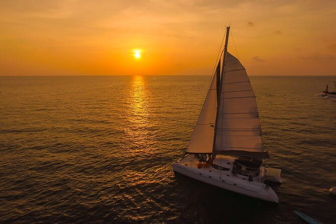 Sunset Catamaran Cruise to Coral Island - Key Points