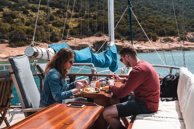 Sunset Dinner Cruise: Sunset, Swim, Drinks, and Dinner Onboard - Onboard Activities and Relaxation