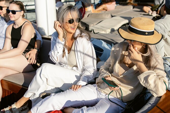 Sunset Dinner Cruise: Sunset, Swim, Drinks, and Dinner Onboard - Friendly and Professional Crew