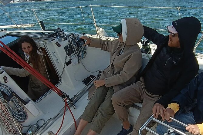 Sunset sailing boat trip in Lisbon with snacks - The Sum Up