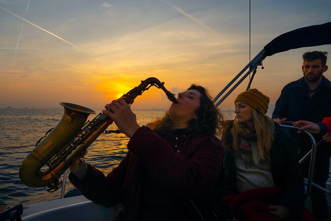 Sunset Sailing Experience with Live Sax Music and Spanish Tapas - Key Points