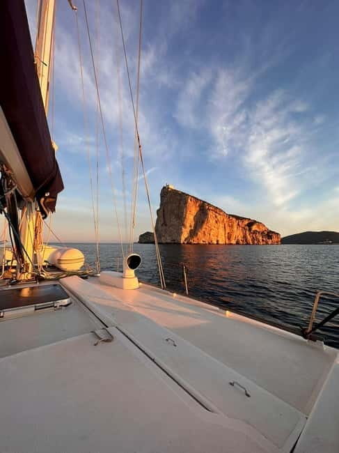 Sunset Sailing Trip along Alghero Coastline with Apéritif - Key Points