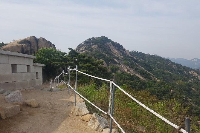 Sunset view & hiking through Seoul Fortress with seafood Market - The Sum Up