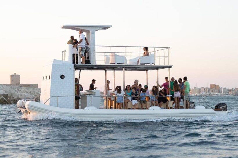 Taormina: BOAT PARTY IN CATAMARANO NELLA BAIA DI TAORMINA - An Authentic Look at the Taormina Boat Party