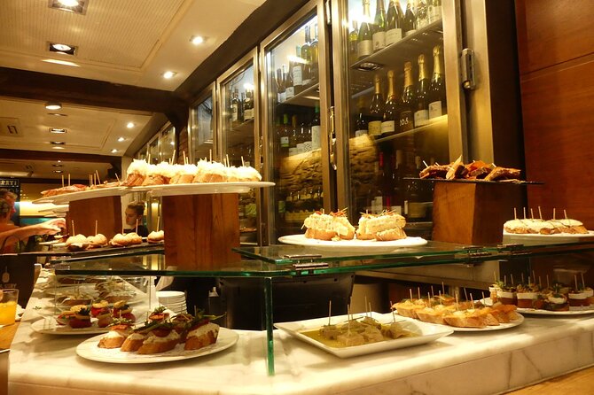 Tapas and Wine Walking Tour in Barcelona - Inclusions, Pricing, and Cancellation Policy