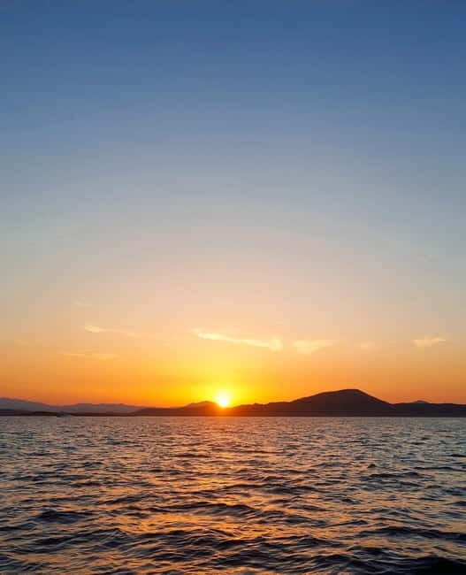Tavolara: Sunset Aperitif Tour with Drinks and local snacks - An Overview of the Experience: What You Can Expect