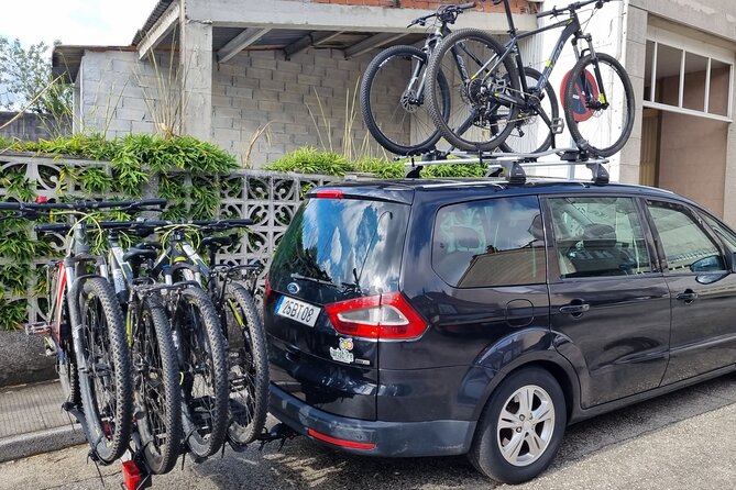 Taxi Bikes transporting Bicycles and Cyclists from Santiago to Porto - The Sum Up