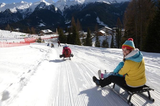 The most famous sledge slope in the Dolomites and a panoramic tour by car - Exploring the Dolomites: A Sledge Slope and Scenic Drive