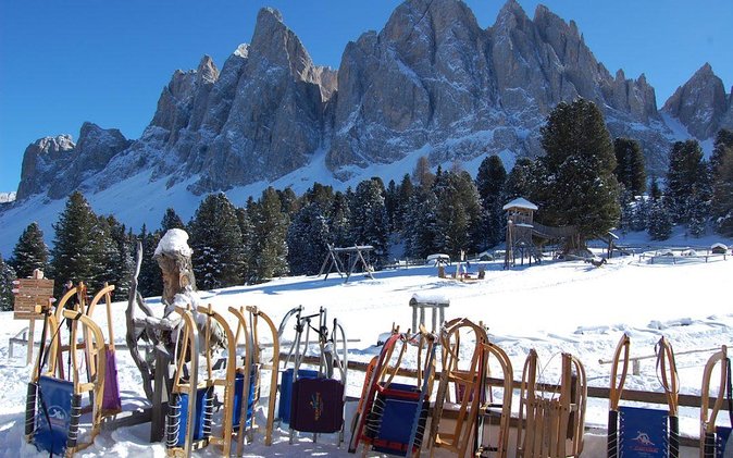 The most famous sledge slope in the Dolomites and a panoramic tour by car - The Sum Up