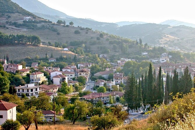 The Top Kalavryta, Rack Railway & Cave of Lakes Private Tour from Athens - Mega Spileo Monastery: A Reflection of Faith and Nature