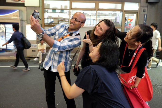 Tokyo by Night: Happy Hour With Karaoke in Shinjuku'S District - Karaoke Experience in a Local Snack Bar