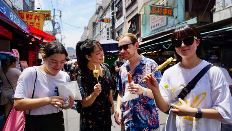 Tokyo Fish Market Food Tour: Street Food & Friendly Guide - Navigating the Seafood Stalls and Learning the Markets History