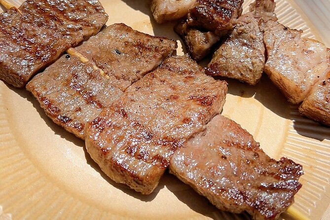 Tokyo: Tsukiji Fish Market Seafood & Street Eats - Experiencing the Tsukiji Hongwanji Temple