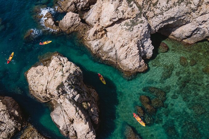 Tossa de Mar: Kayak & Snorkel Tour with Paella from Barcelona - Key Points