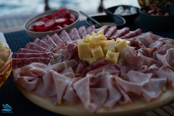 Tour of Apericena at Sunset and Dinner on Boat - Dining on the Boat