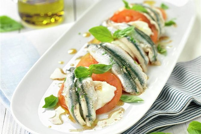 Tour Paella and Malaga Market With an Official Guide - Visit the Atarazanas Market