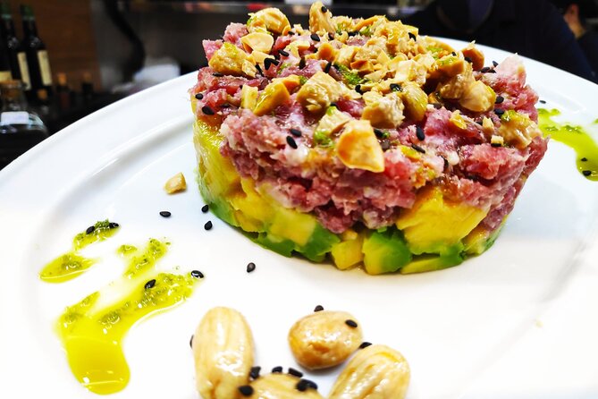 Tour Paella and Malaga Market With an Official Guide - Participant Experiences and Feedback