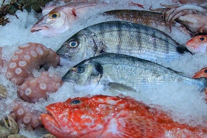 Tour Paella and Malaga Market With an Official Guide - Meeting and Ending Points