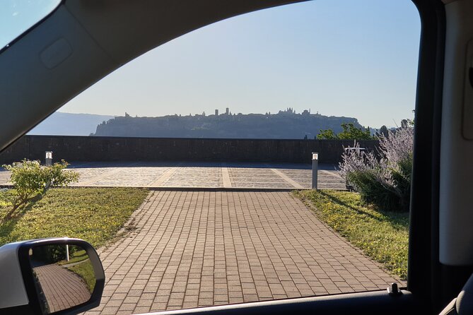 Tour to Civita di Bagnoregio and Bolsena with Panoramic stops - The Experience of Traveling with Juna Pani