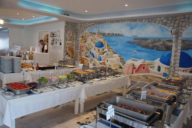 Traditional Greek Night Live Music & Dinner Show in Santorini - Tips for Attending